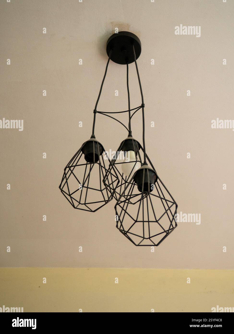 Three platforms chandelier. Lighting fixture. There are not enough ...