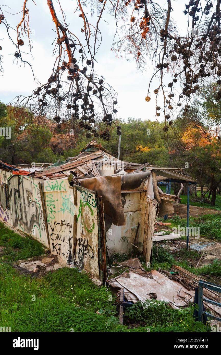 Vouliagmeni, Greece - February 28, 2025. An old, dilapidated house ...