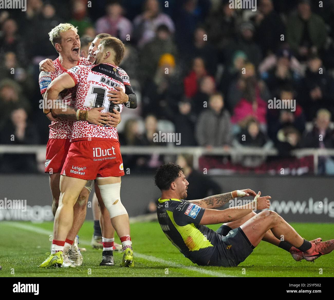 Leigh Leopards' Ethan O'Neill (left) celebrates scoring a try against ...