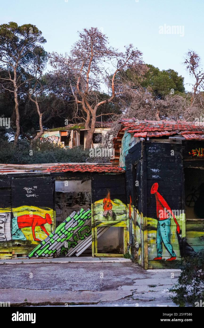 Vouliagmeni, Greece - February 28, 2025. An old, dilapidated wooden ...