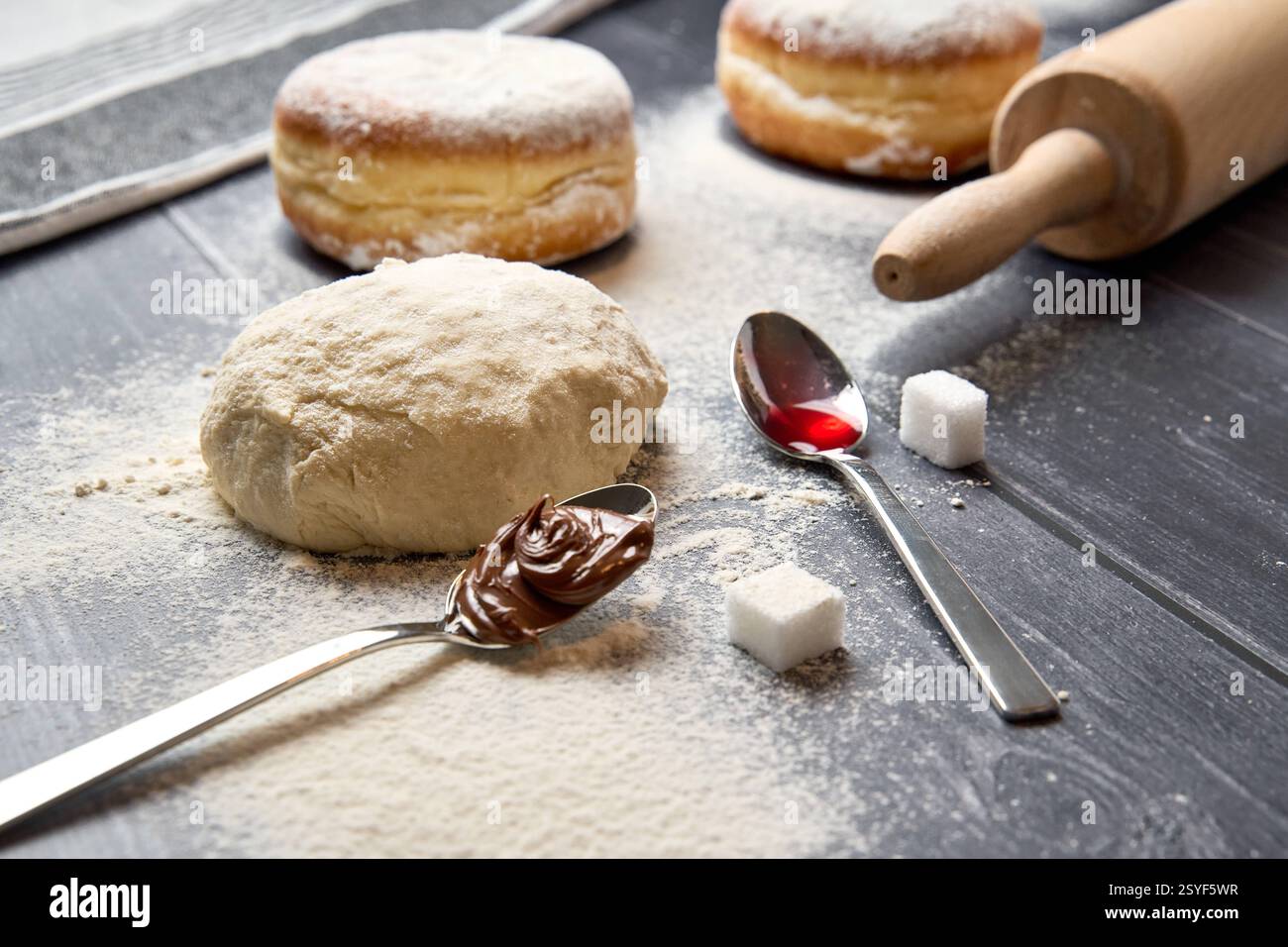 Germany - February 28, 2025: A lump of raw yeast dough lies on a ...