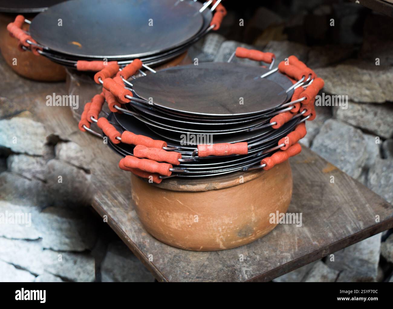 Set of new metal pans as cookware Stock Photo - Alamy