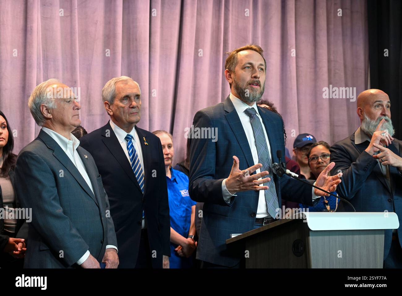 Austin, Tx, USA. 28th Feb, 2025. Travis County Judge ANDY BROWN speaks ...
