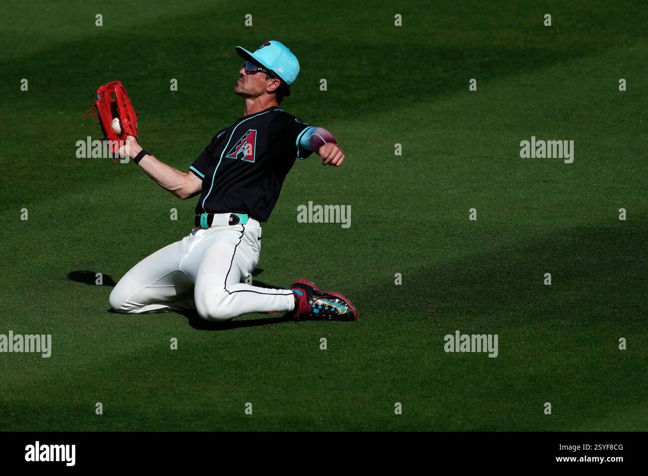 Arizona Diamondbacks' Corbin Carroll catches a fly out hit by Kansas ...