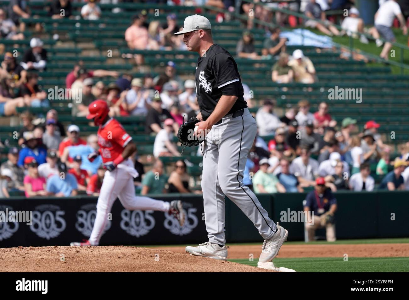 Chicago White Sox pitcher Jared Shuster, right, pauses on the mound ...