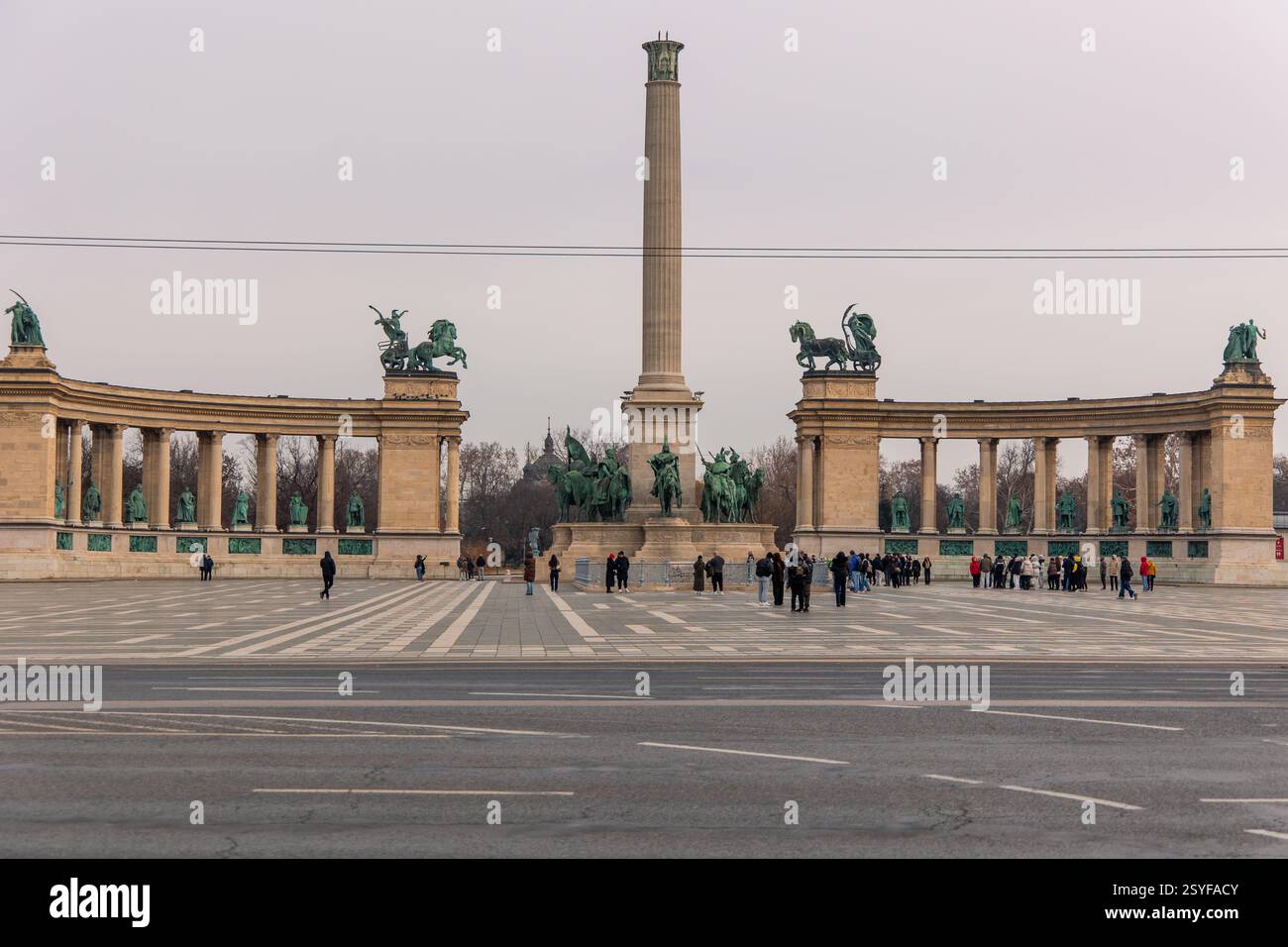 02-17-2025, Budapest. Tourists admiring Heroes' Square, a UNESCO World ...