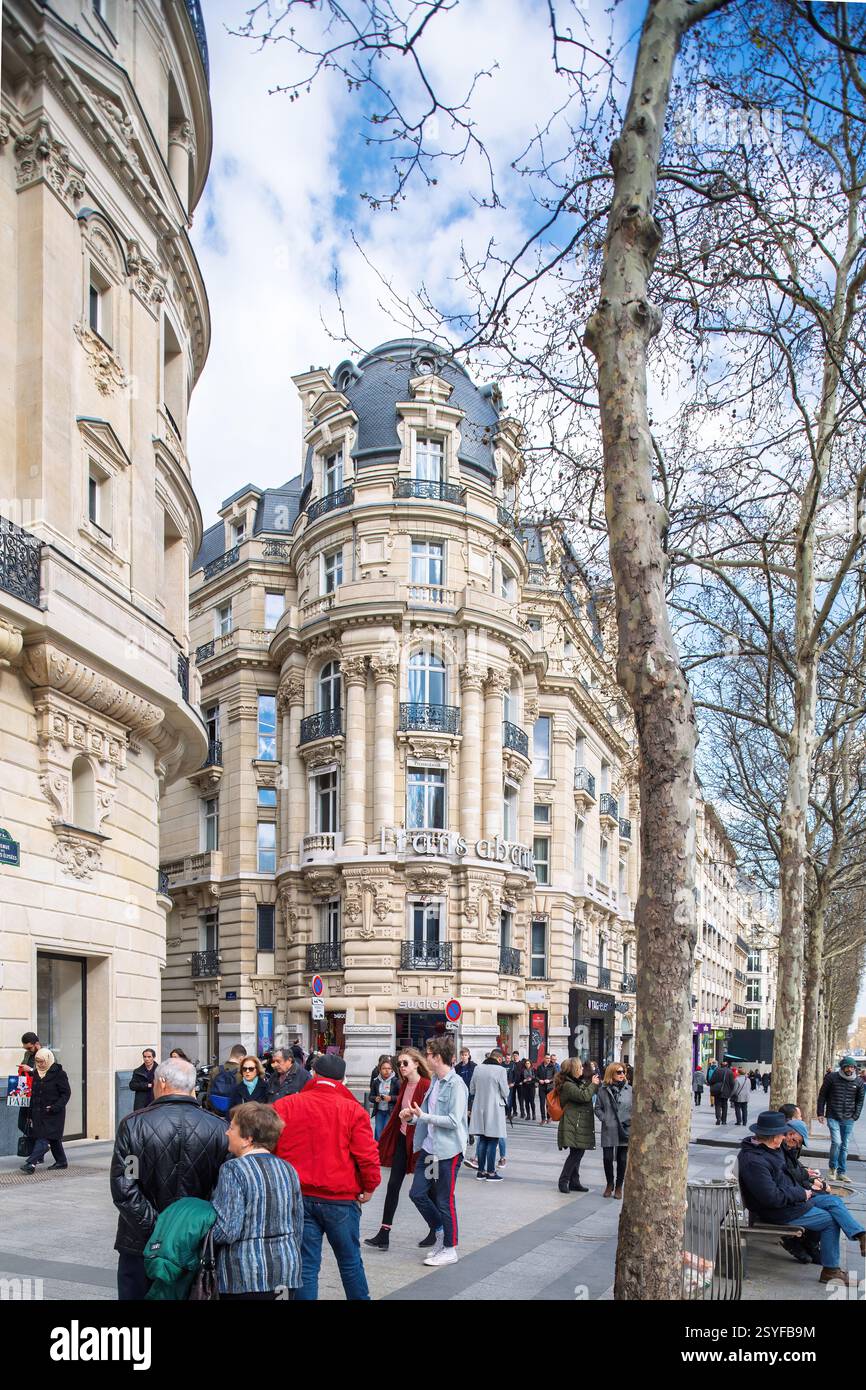 Paris, France - Mar 3, 2019: A lively street scene on the Champs ...