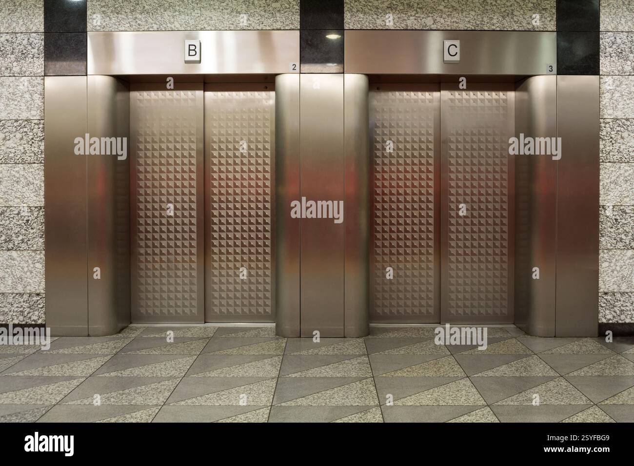 Two elevator doors hi-res stock photography and images - Alamy