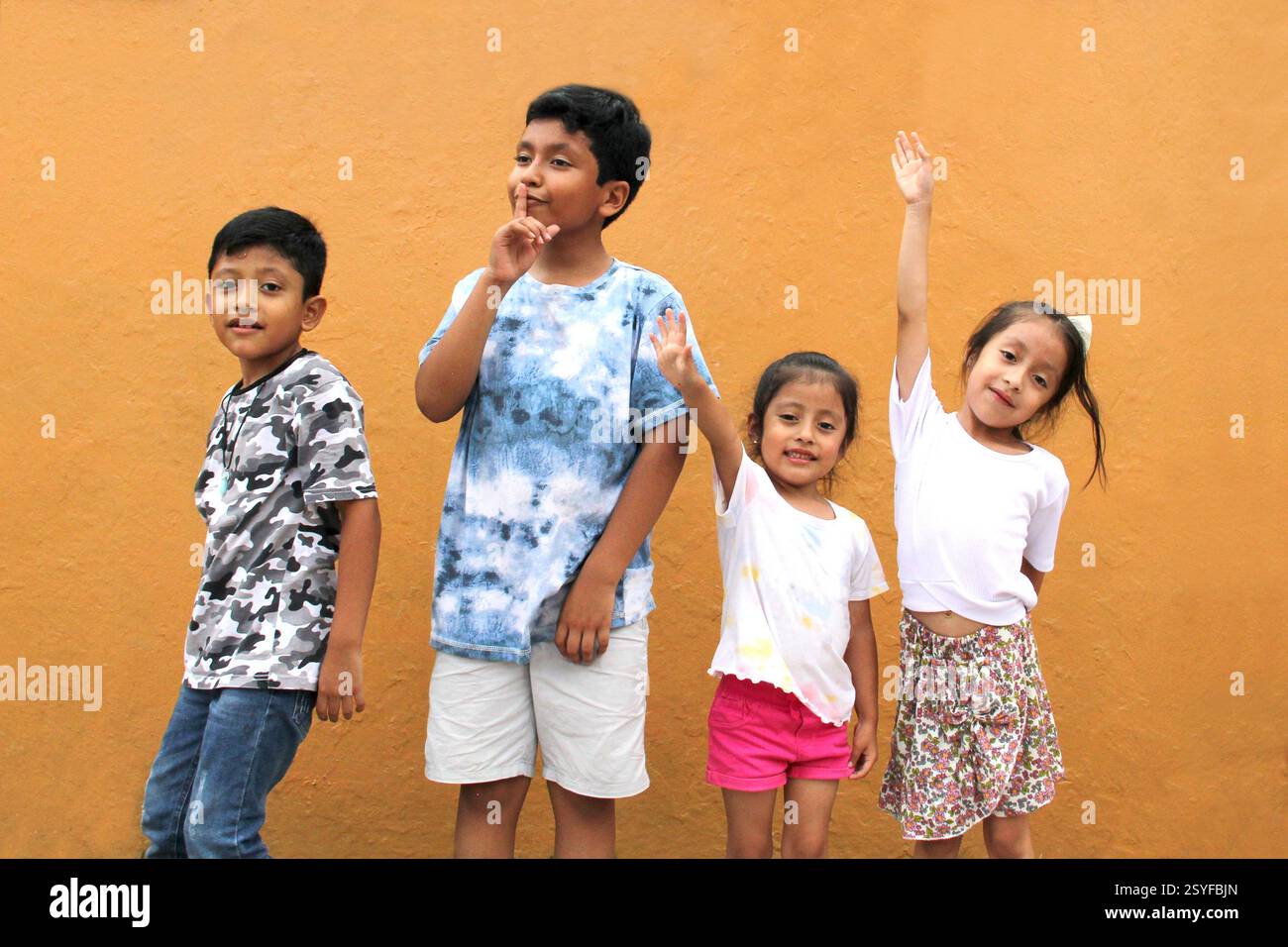 Boys and girls together play and have fun outdoors celebrating their ...