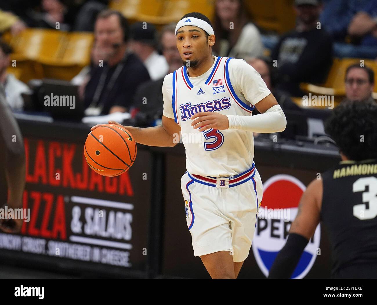 Kansas guard Dajuan Harris Jr. (3) in the first half of an NCAA college ...