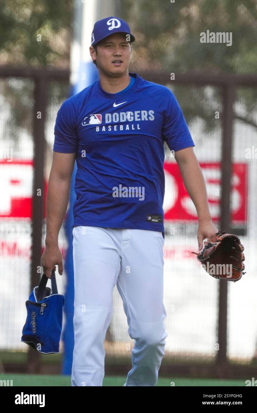 Los Angeles Dodgers two-way player Shohei Ohtani attends a spring ...