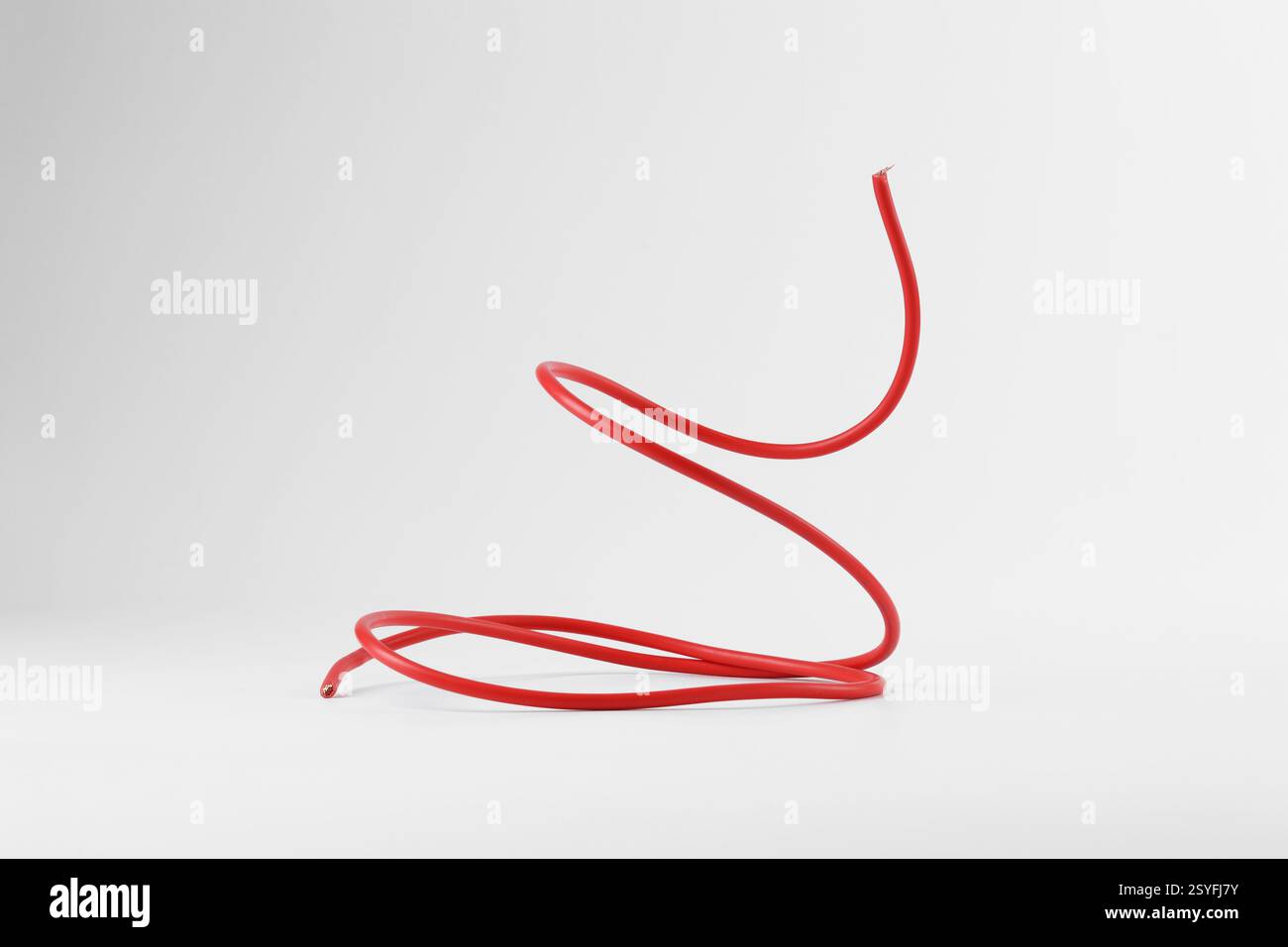 One red electrical wire isolated on white Stock Photo - Alamy