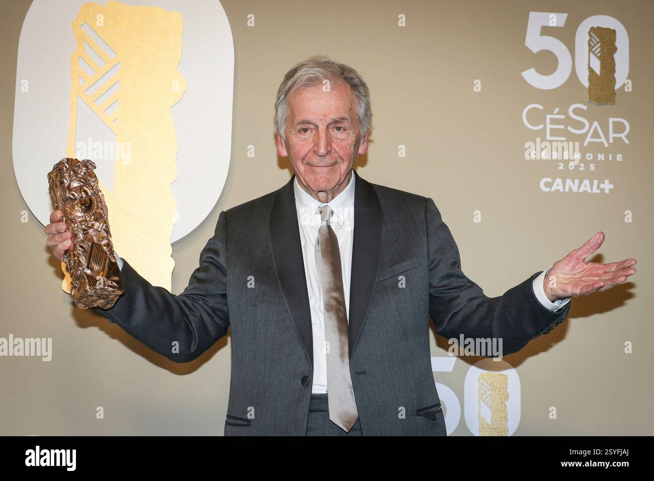Costa Gavras poses after receiving the Cesar of Honor award during the 50th Cesar Awards ...