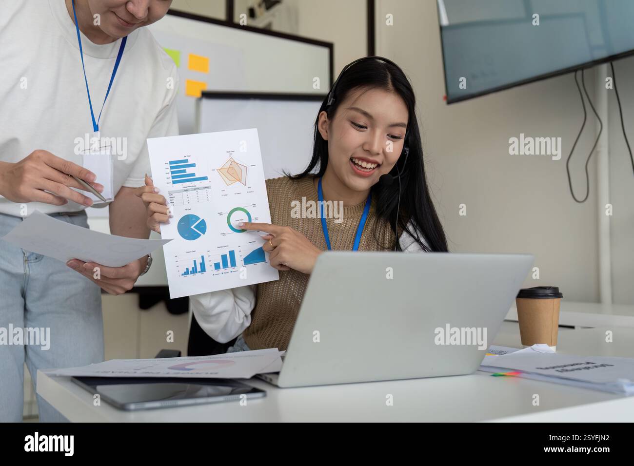 Team members collaborating on financial analysis, sharing insights and ...