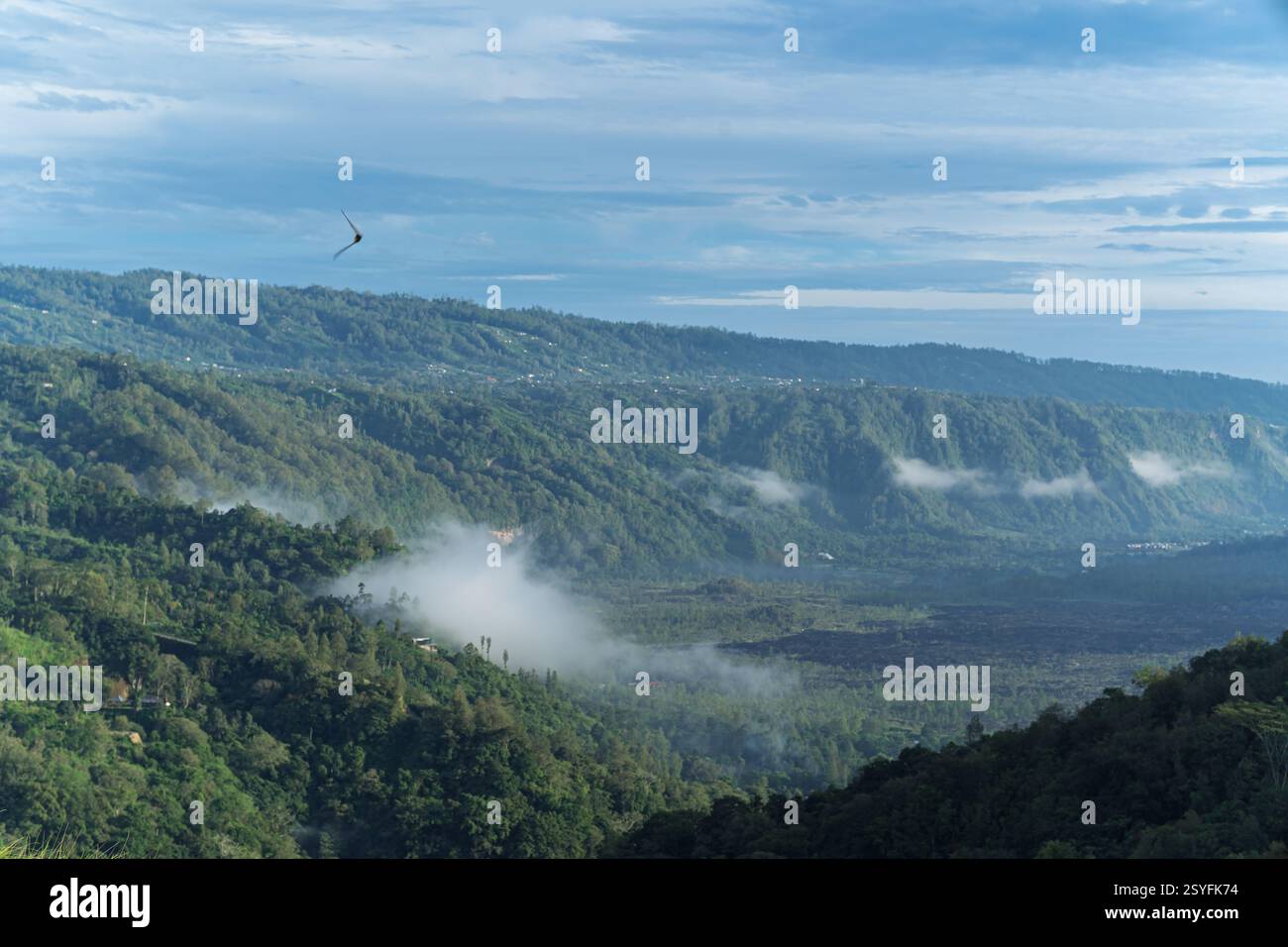 Beautiful landscape view of Kintamani, with amazing hills and clouds in ...