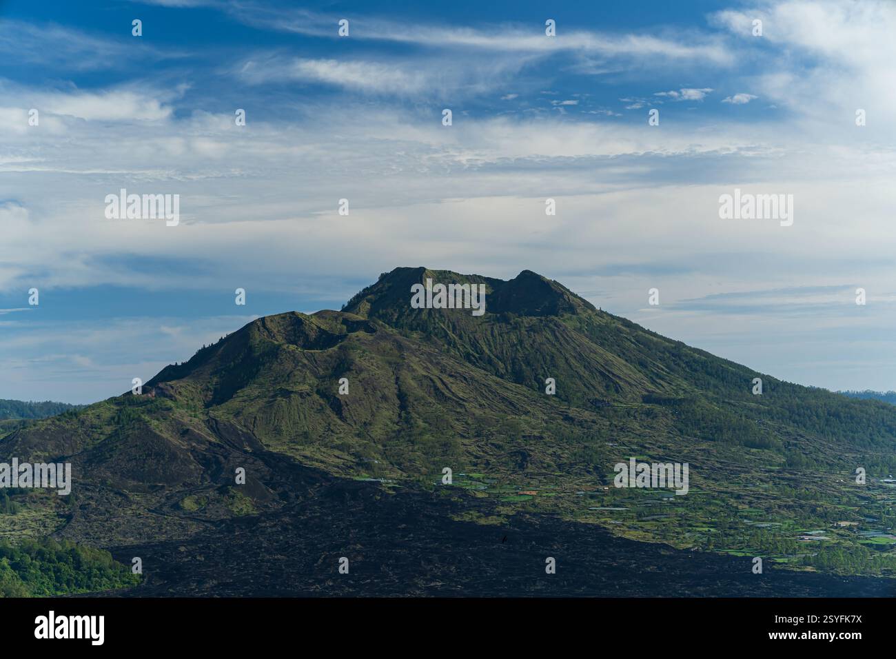 Beautiful view of Mount Batur in Kintamani, Bali. Isolated by cloudy ...