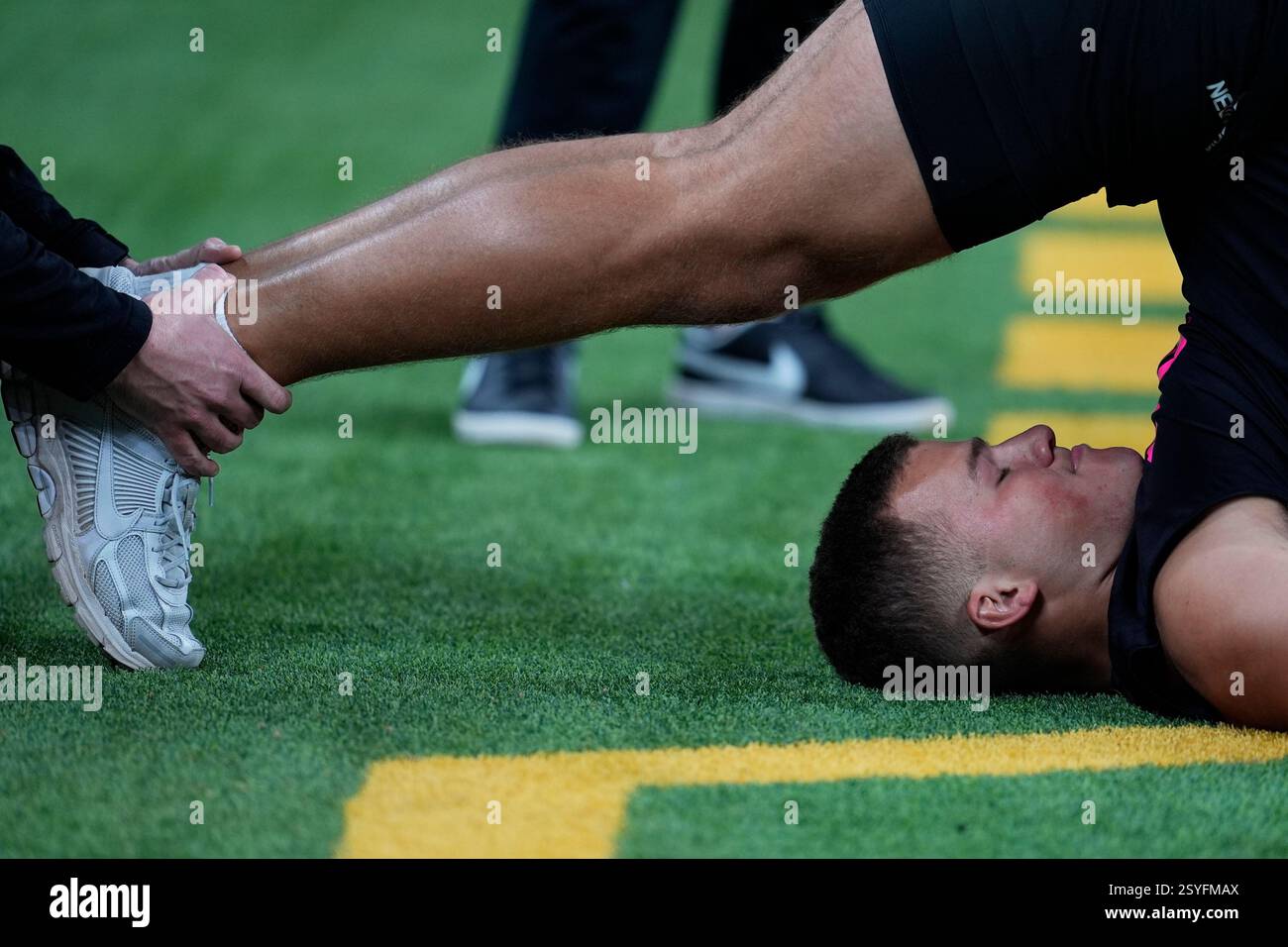LSU tight end Mason Taylor is measured at the NFL football scouting ...