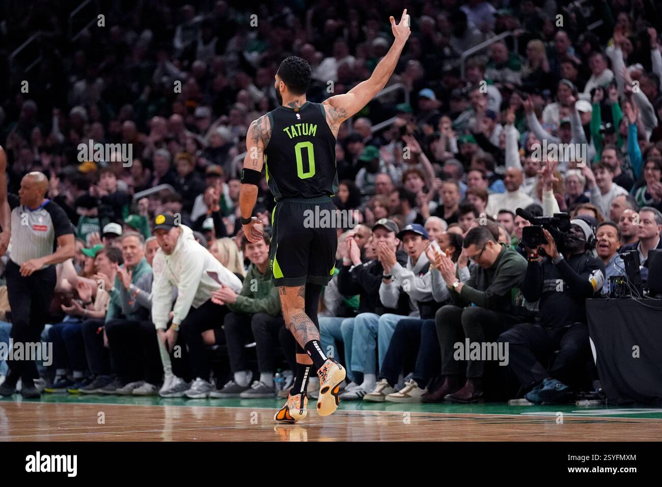Boston Celtics forward Jayson Tatum (0) celebrates after making a 3 ...