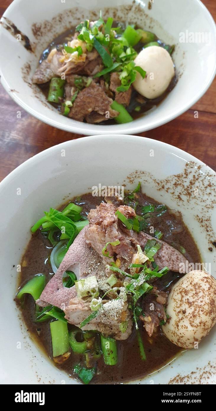 Braised beef clear noodle with meat balls soup stew (Ekaehla meat) with ...