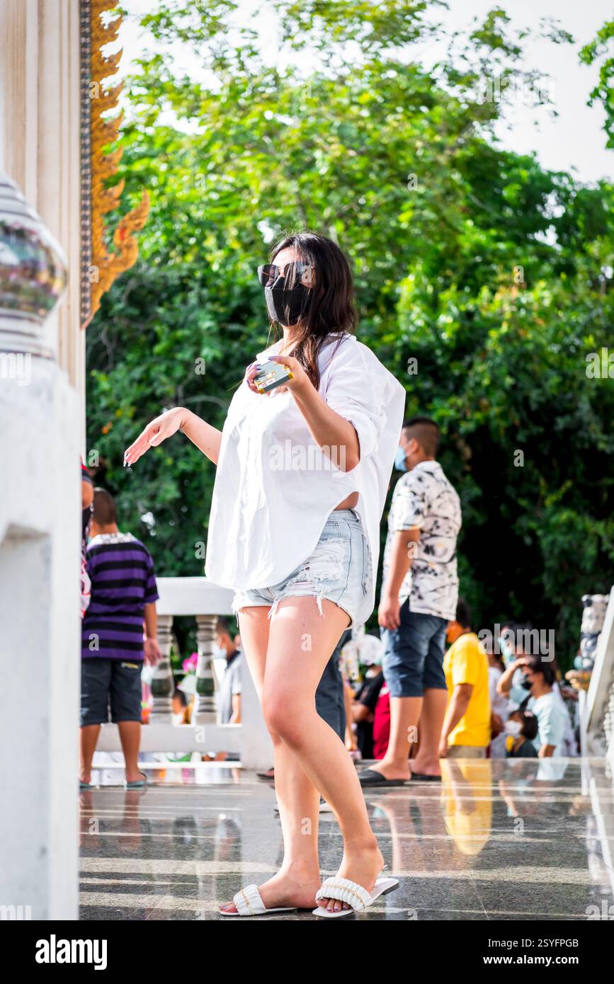 Woman in event of ordination ceremony in buddhist Thai monk ritual for ...