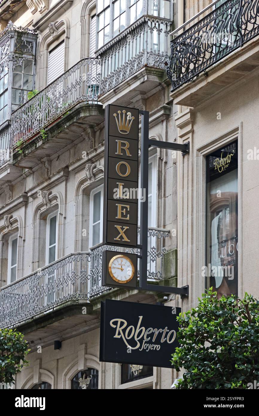 Rolex sign and clock outside Roberto Joyero shop, Vigo Stock Photo - Alamy