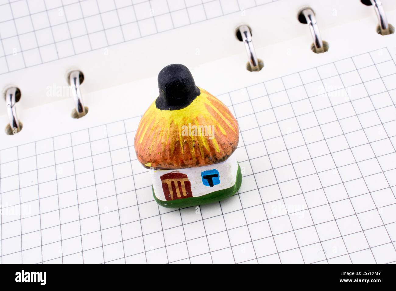 Hut model on a spiral notebook Stock Photo - Alamy