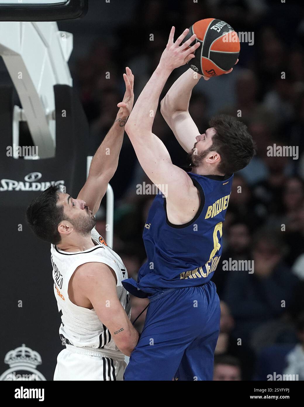 Madrid, Spain. 27th Feb, 2025. Real Madrid's Facundo Campazzo (l) and ...
