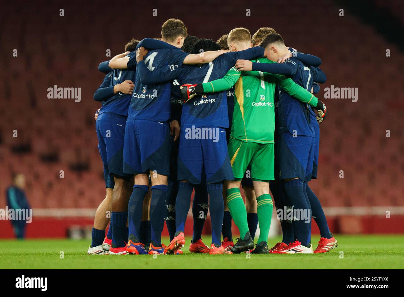 London, UK. 28th Feb, 2025. The Manchester United huddle during the ...