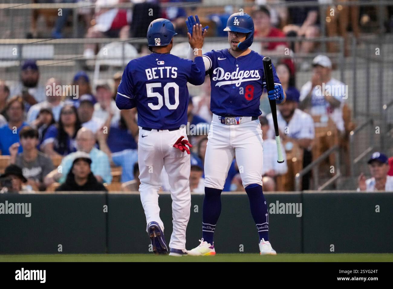 Los Angeles Dodgers' Mookie Betts (50) celebrates with Kiké Hernandez ...