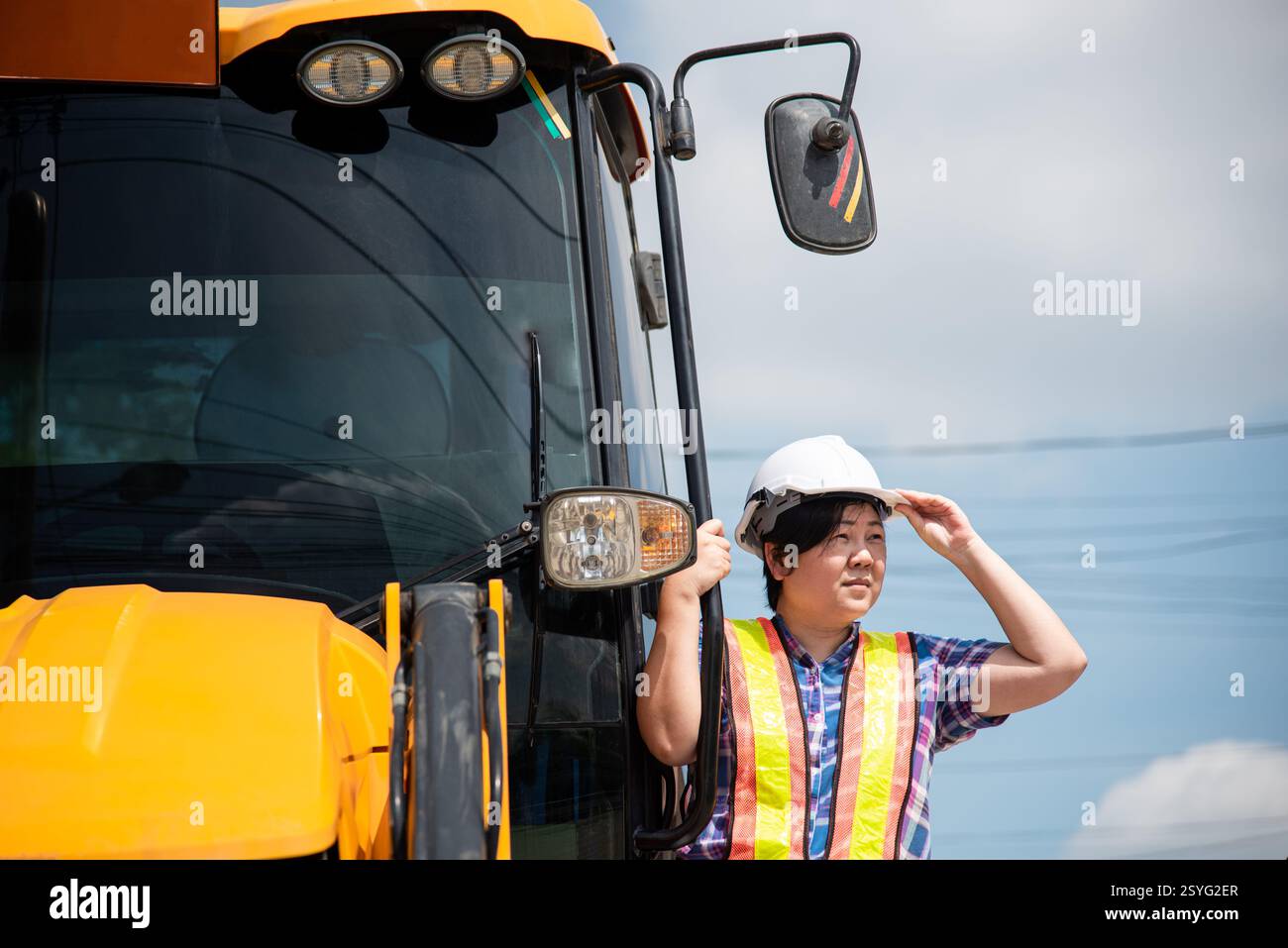 Asian woman civil construction engineer worker or architect with helmet ...