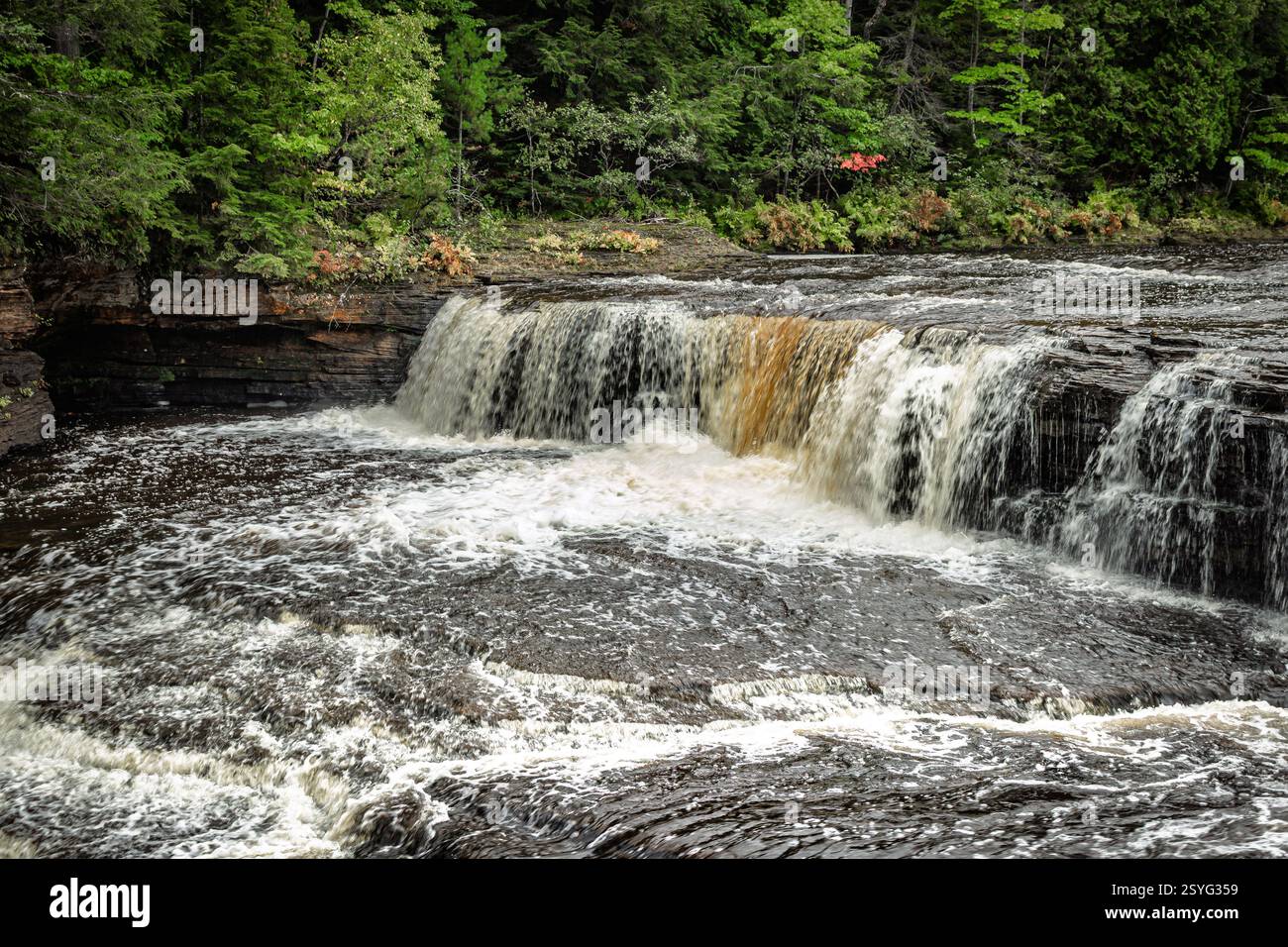 A stunning autumn landscape featuring the Lower Falls at Tahquamenon ...
