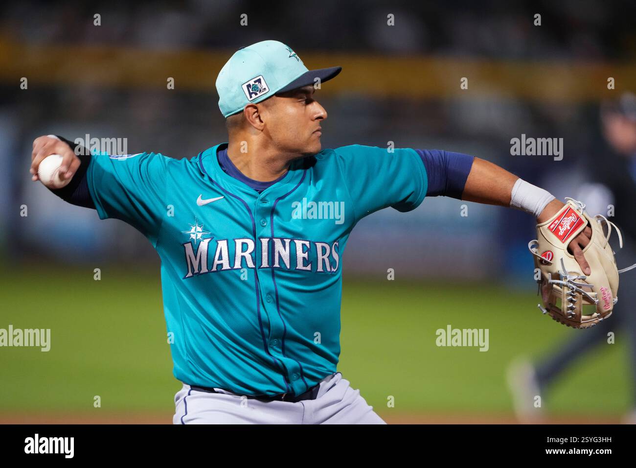 Seattle Mariners third baseman Donovan Solano throws to first for the ...