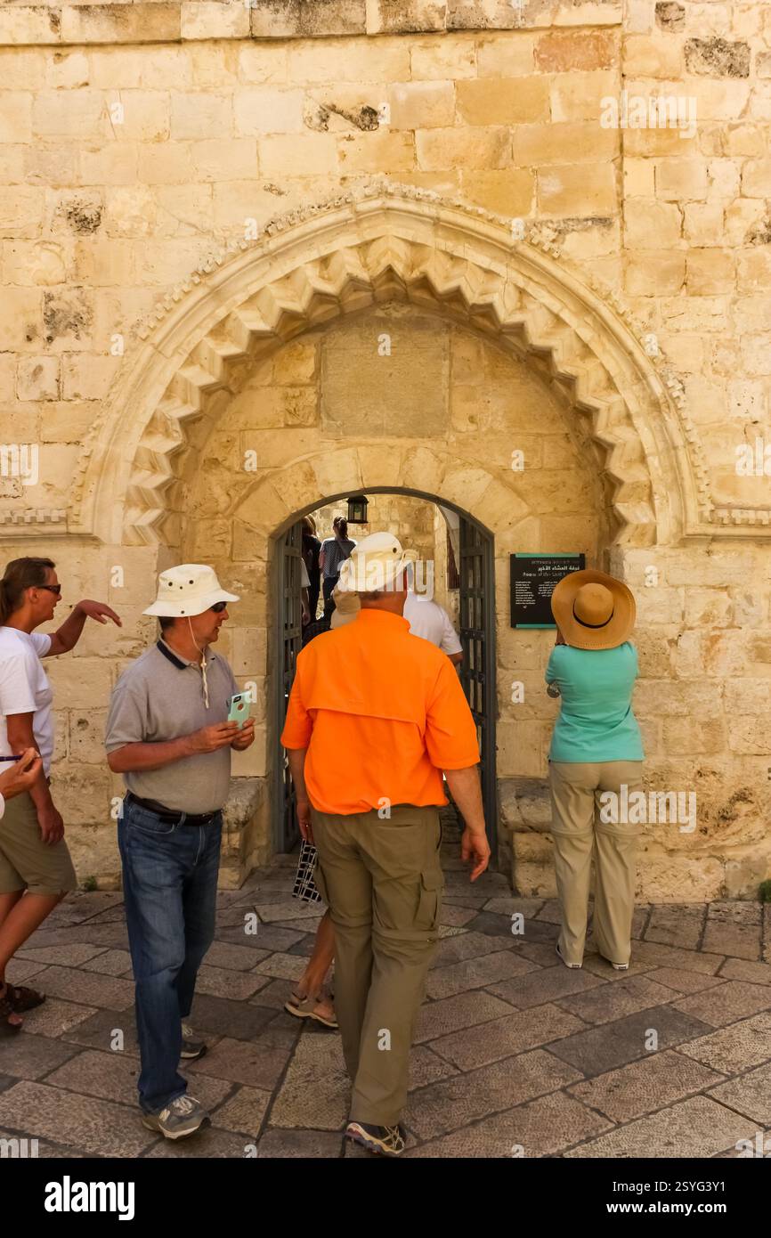 Tourists outside the entrance to the Upper Room in the Cenacle bldg ...