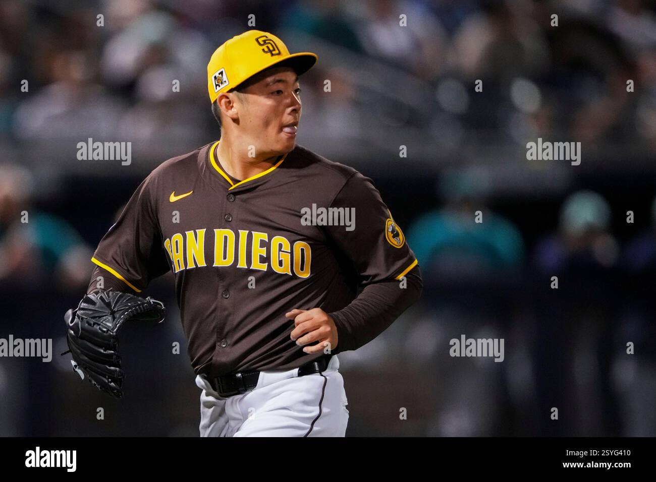 San Diego Padres relief pitcher Yuki Matsui returns to the dugout after ...