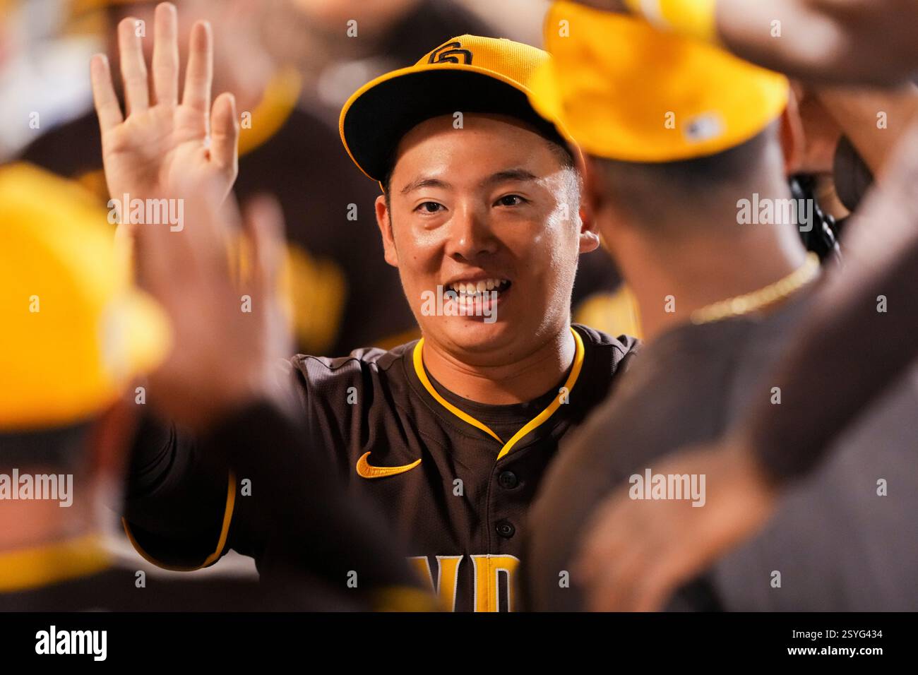 San Diego Padres relief pitcher Yuki Matsui gets high-fives in the ...