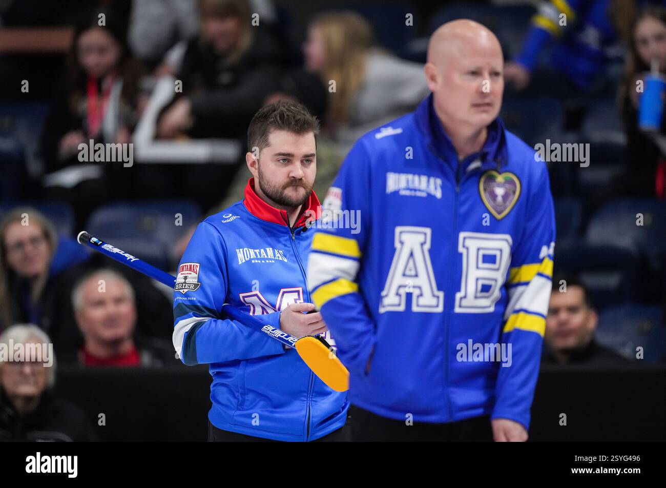 Manitoba-Dunstone skip Matt Dunstone, left, watches as Alberta-Koe skip ...
