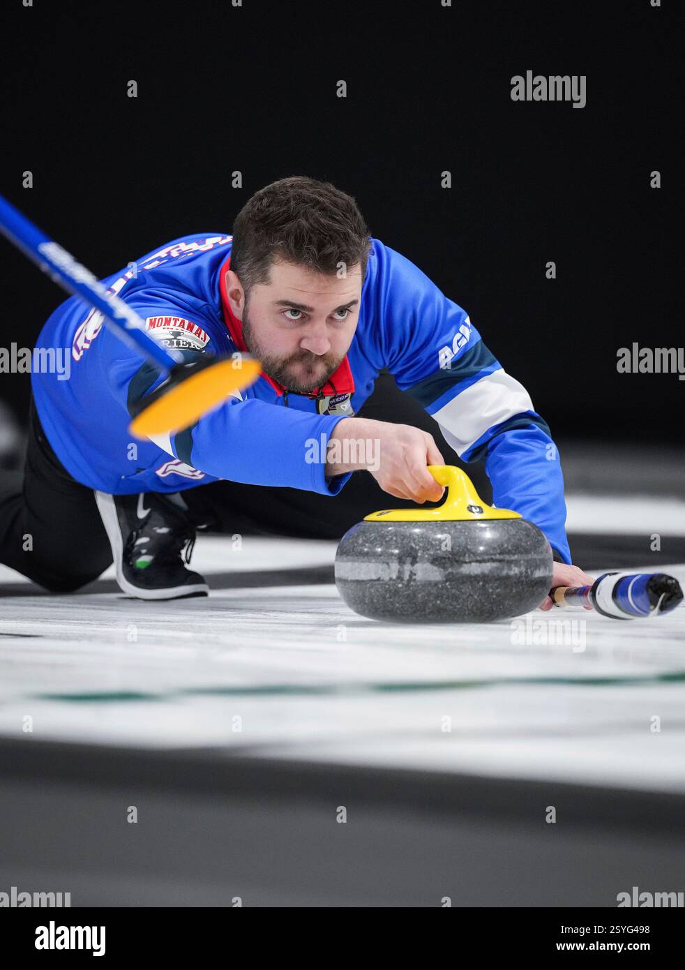 Manitoba-Dunstone skip Matt Dunstone delivers a rock while playing ...