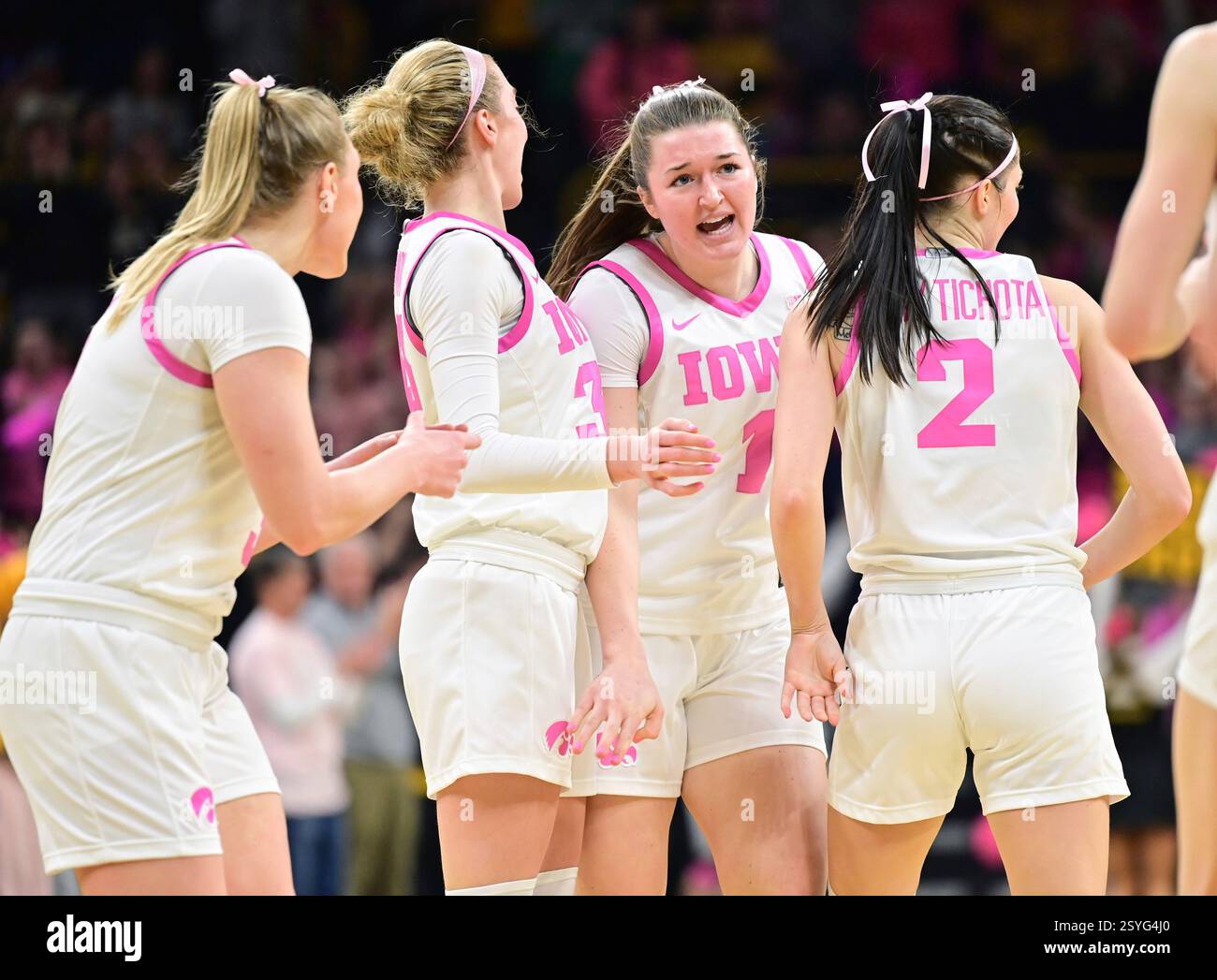 IOWA CITY, IA - FEBRUARY 23: Iowa players celebrate after a three-point ...