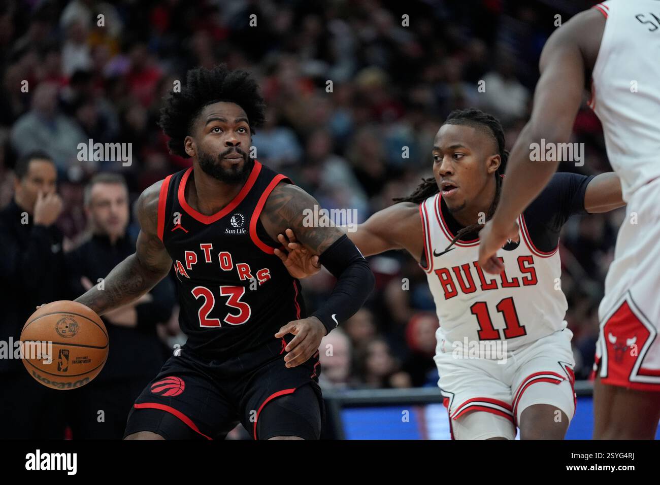 Chicago Bulls guard Ayo Dosunmu (11) guards against Toronto Raptors ...