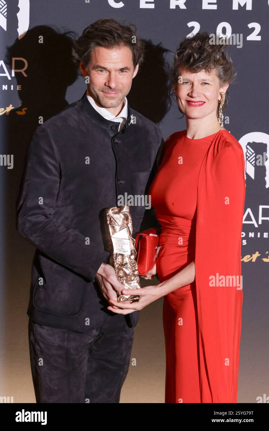 Clement Ducol and Camille posing upon arrival at the Gala Dinner ...