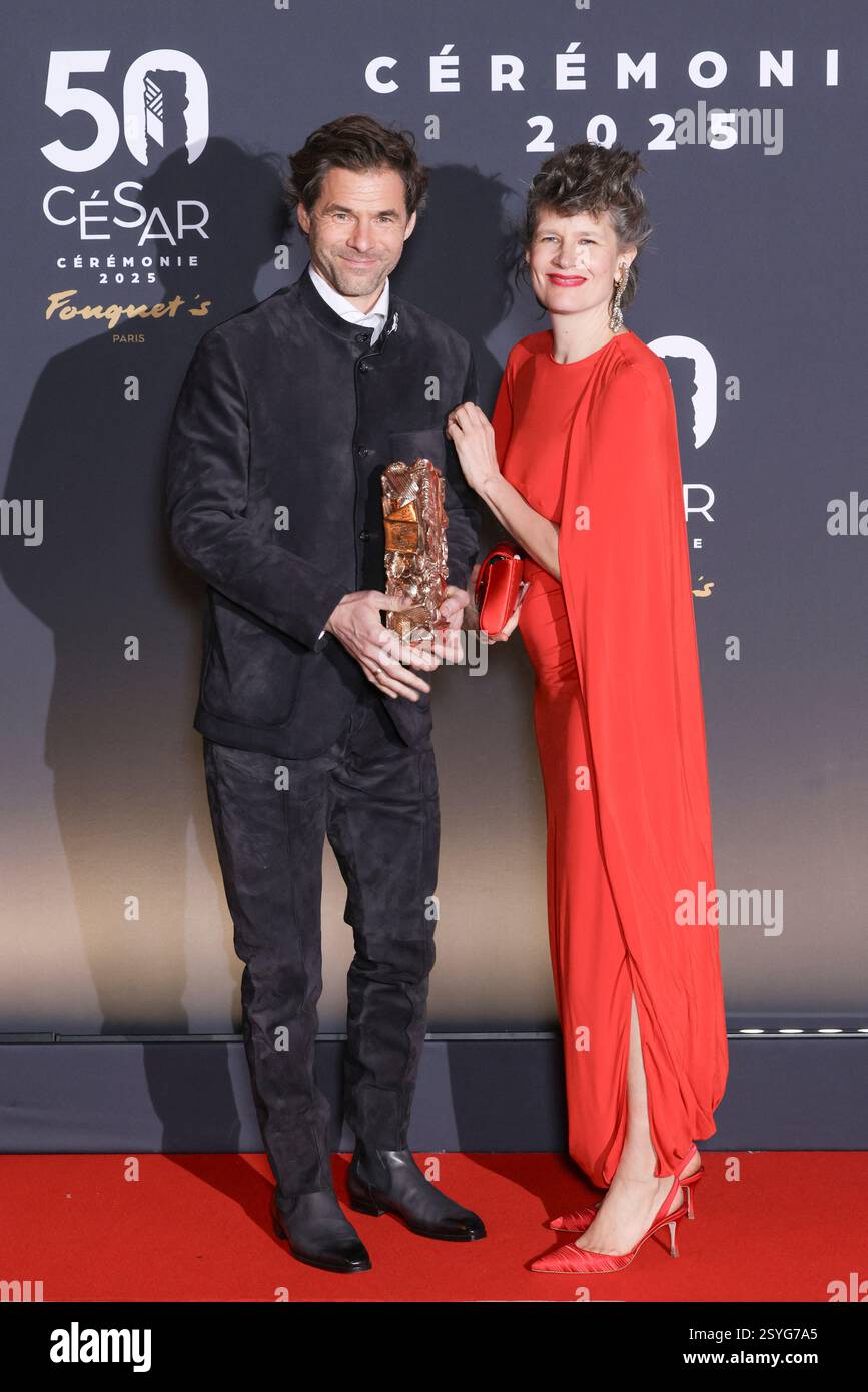 Clement Ducol and Camille posing upon arrival at the Gala Dinner ...