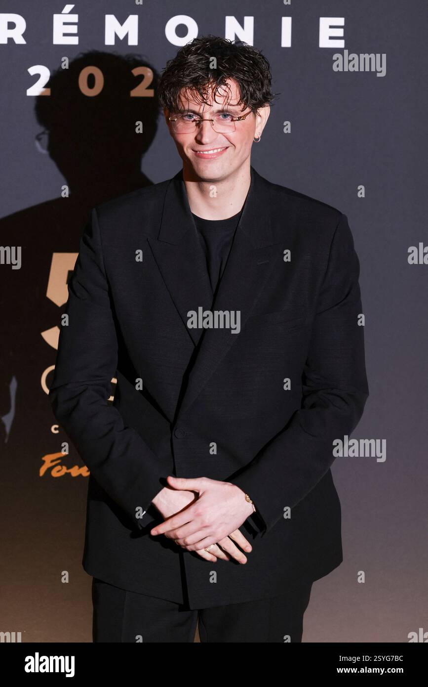 Raphael Quenard posing upon arrival at the Gala Dinner following the ...