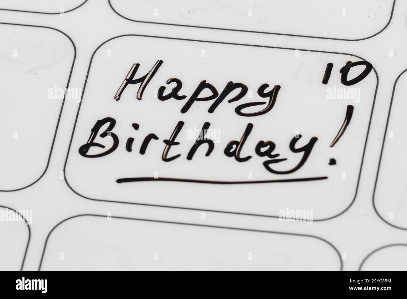 A joyful handwritten message expresses happy 10th birthday wishes on a ...
