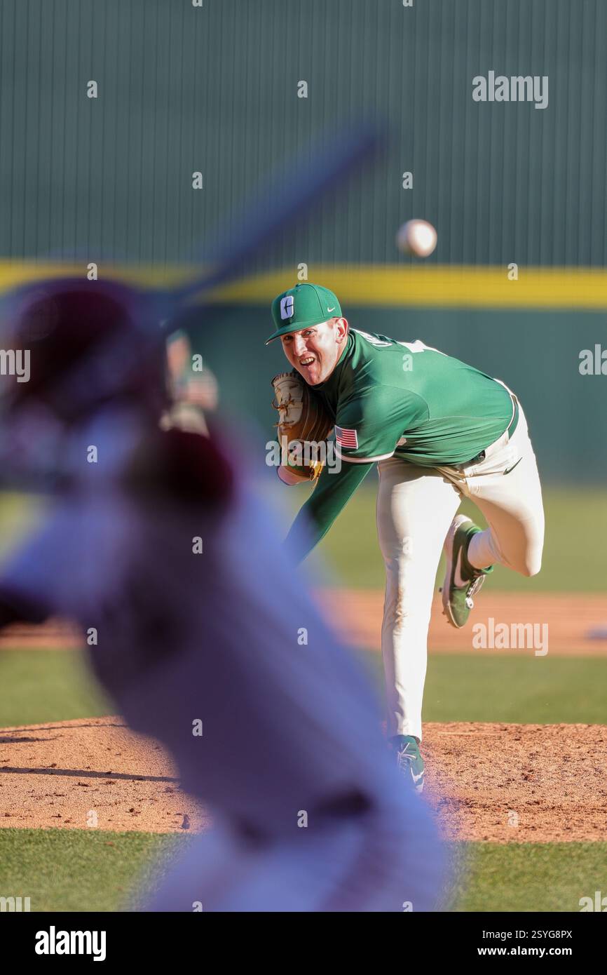 February 28, 2025: Charlotte pitcher Chase Carson (12) watches as a ...
