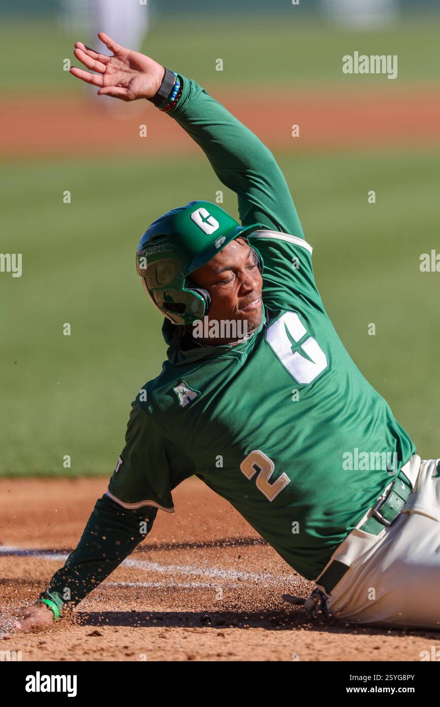 February 28, 2025: Charlotte base runner Thad Ector (2) slides safely ...