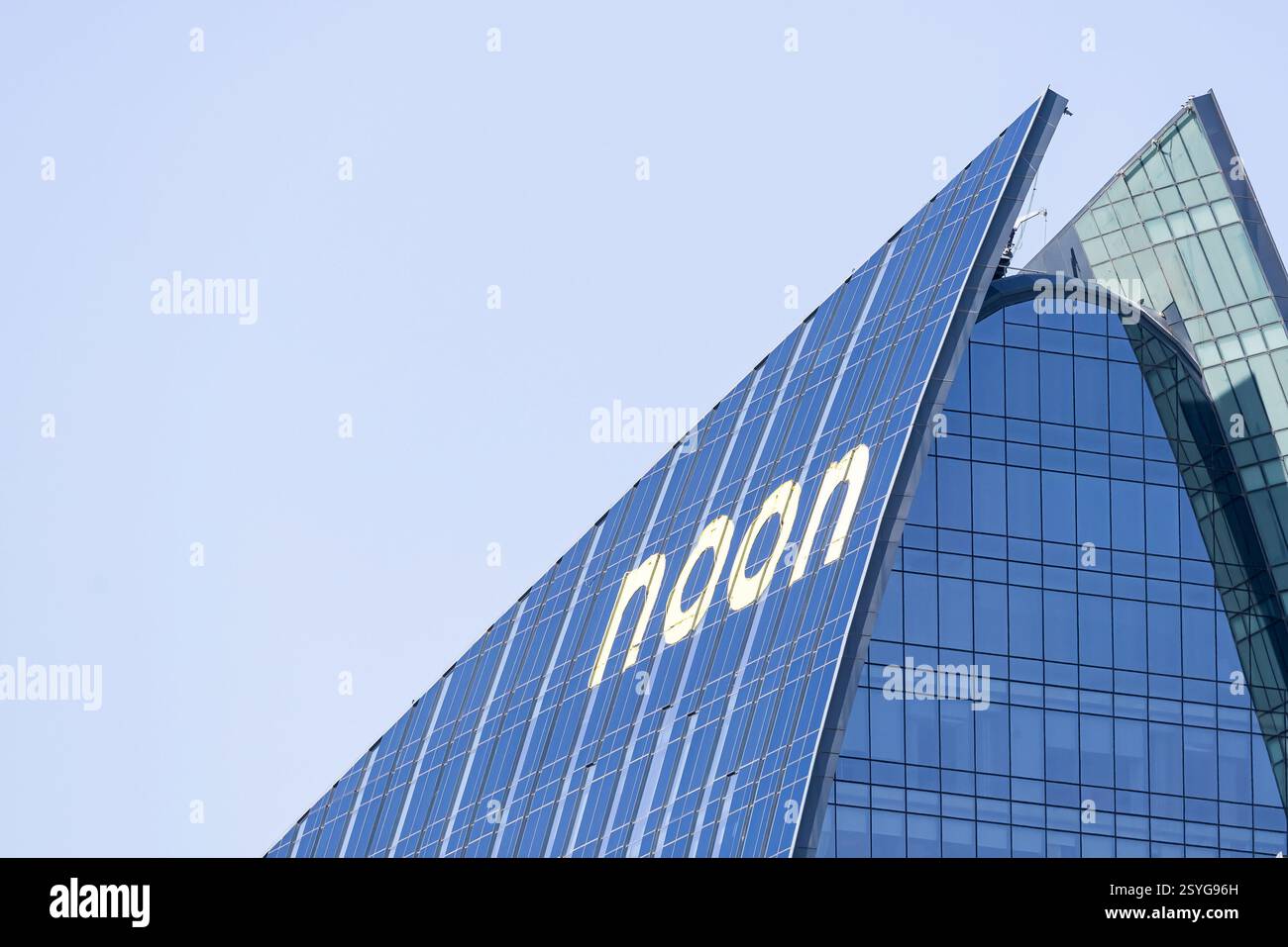 logo of retail company noon on business center glass building . Dubai ...
