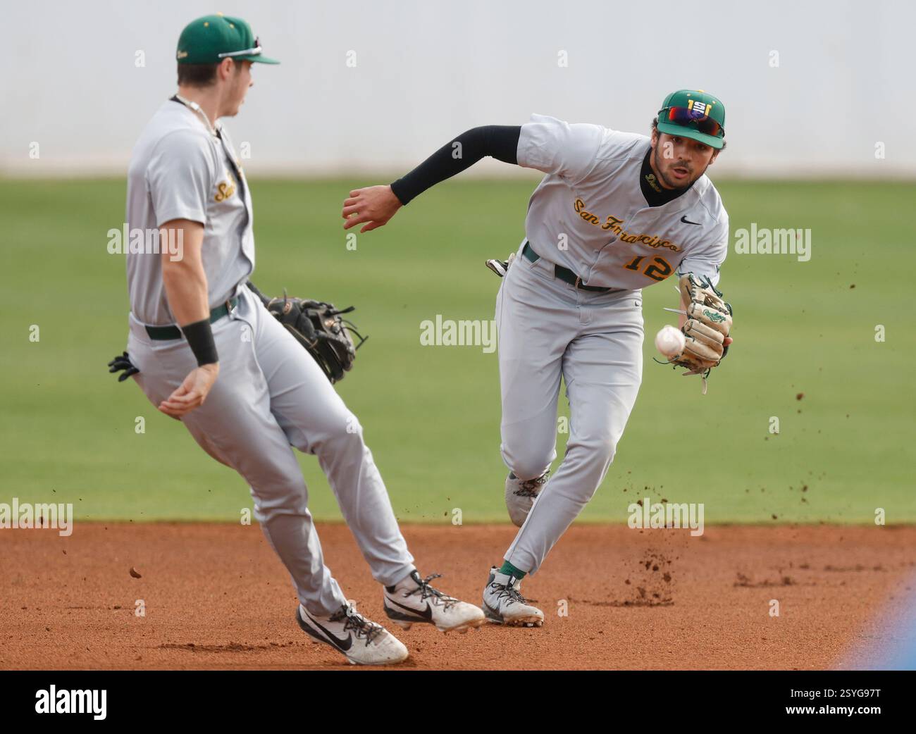 San Francisco infielder TJ Rogers (12) fields the ball during an NCAA ...