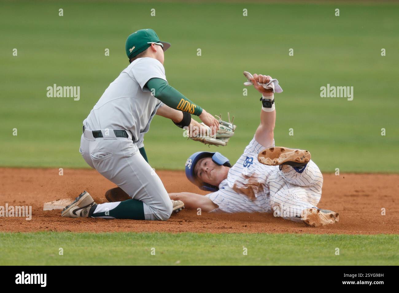 San Jose State base runner Jake Maroney (5) slides around the tag by ...