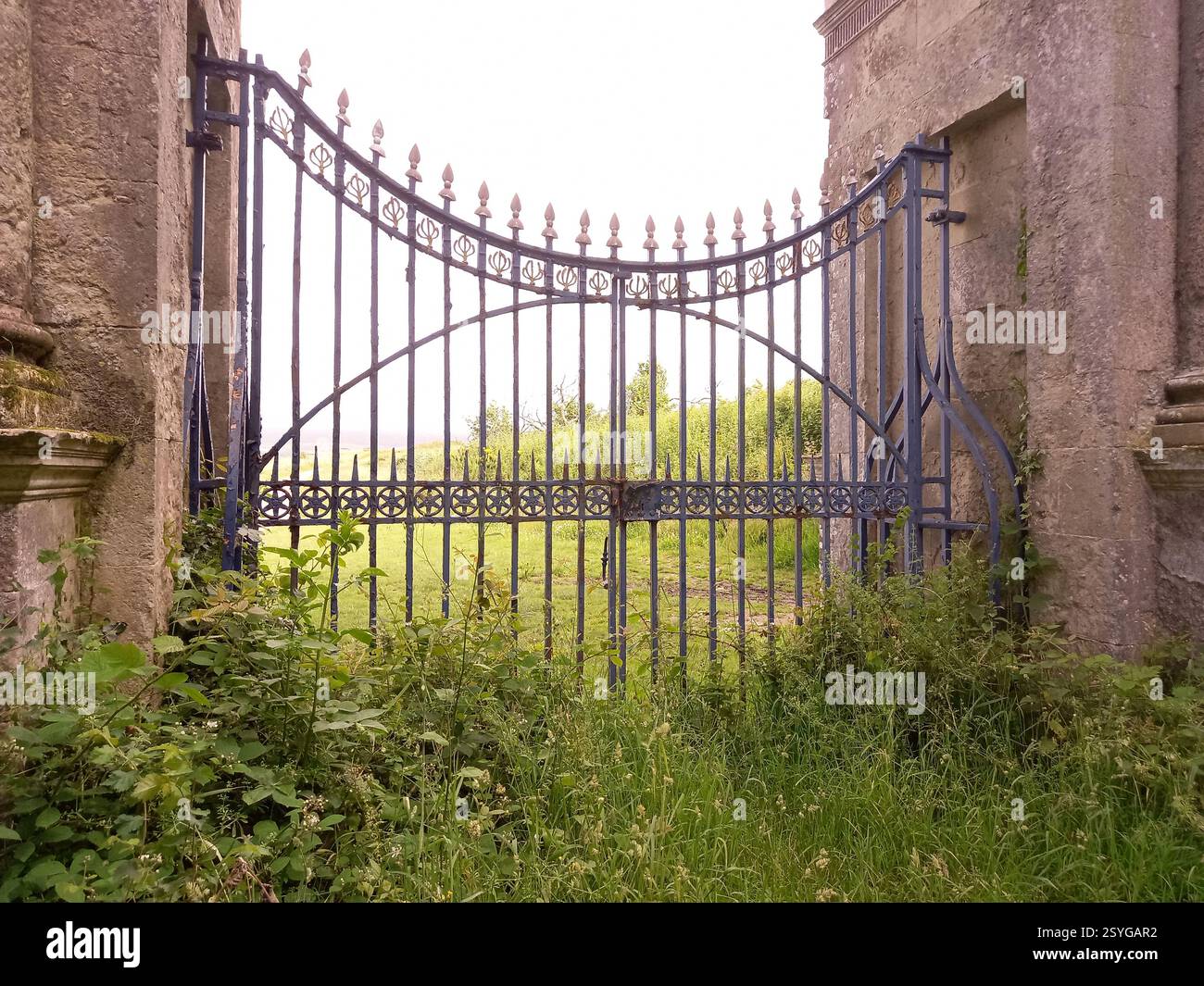 Haunted Old Wrought Ironwork Gates, Rusting In An Abandoned Ruined Gate ...