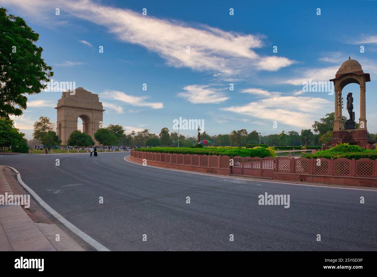 Beautiful view of India Gate on a blue cloudy evening, war memorial arch located near the ...